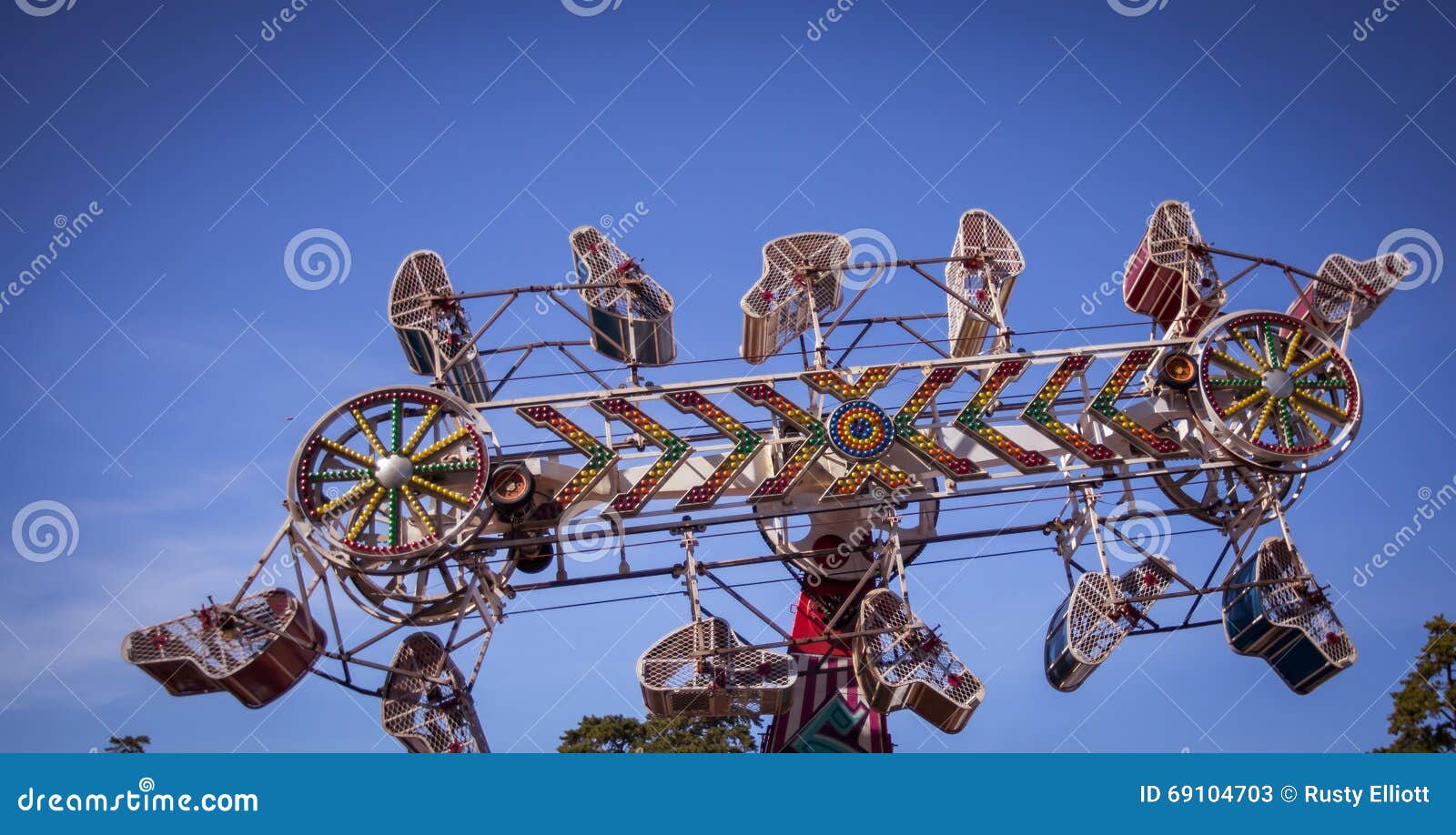 Amusement park ride stock image. Image of fair, zipper - 69104703
