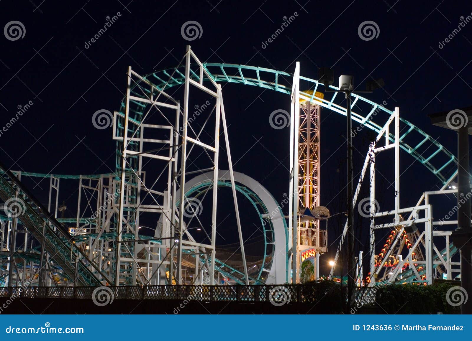 Amusement Park Rides at Night Stock Photo - Image of loop, rides: 1243636
