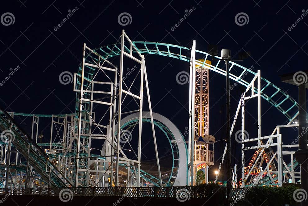 Amusement Park Rides at Night Stock Photo - Image of loop, rides: 1243636