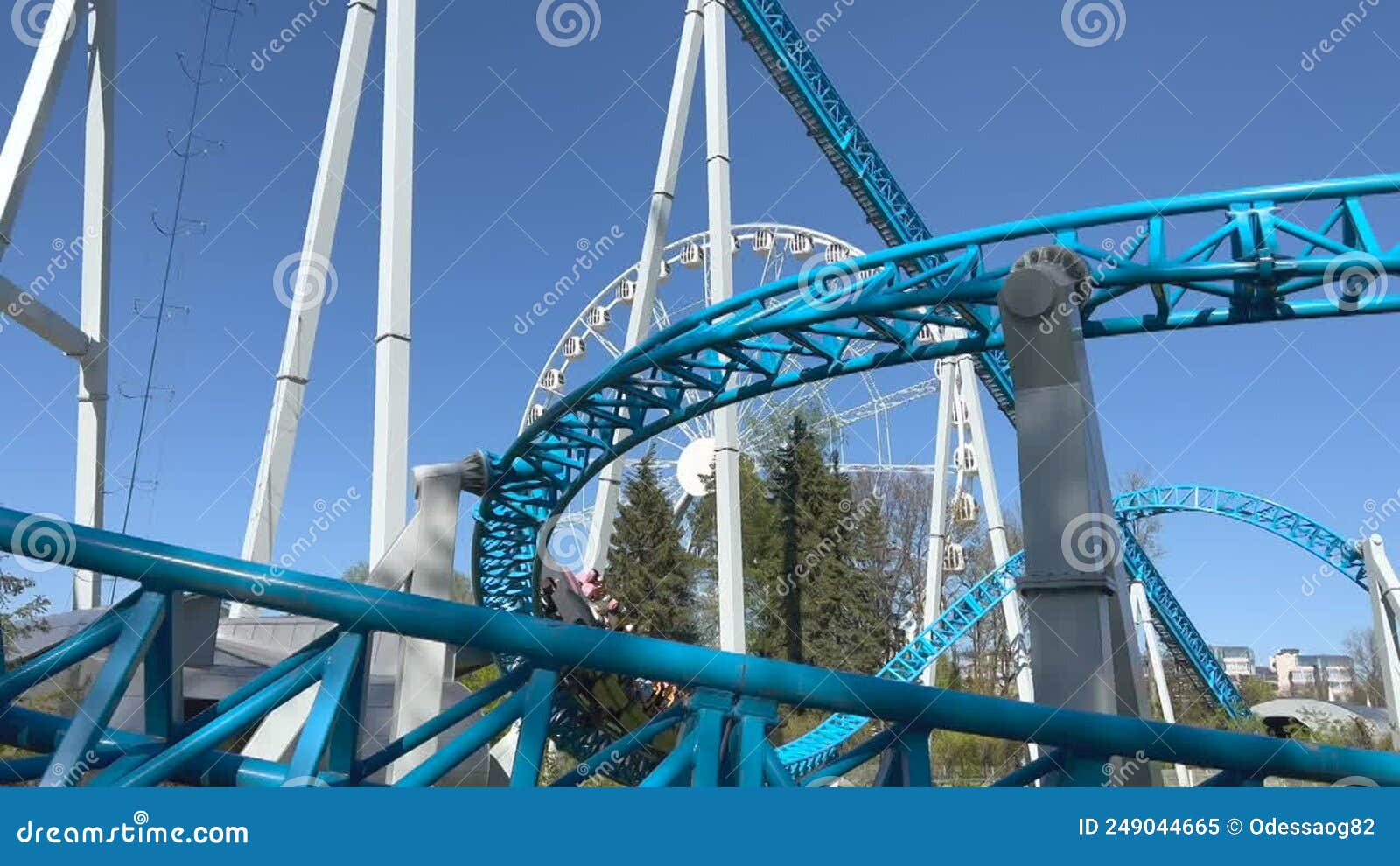 Amusement Park with Roller Coaster and Scary Rocket Ride Stock Video ...