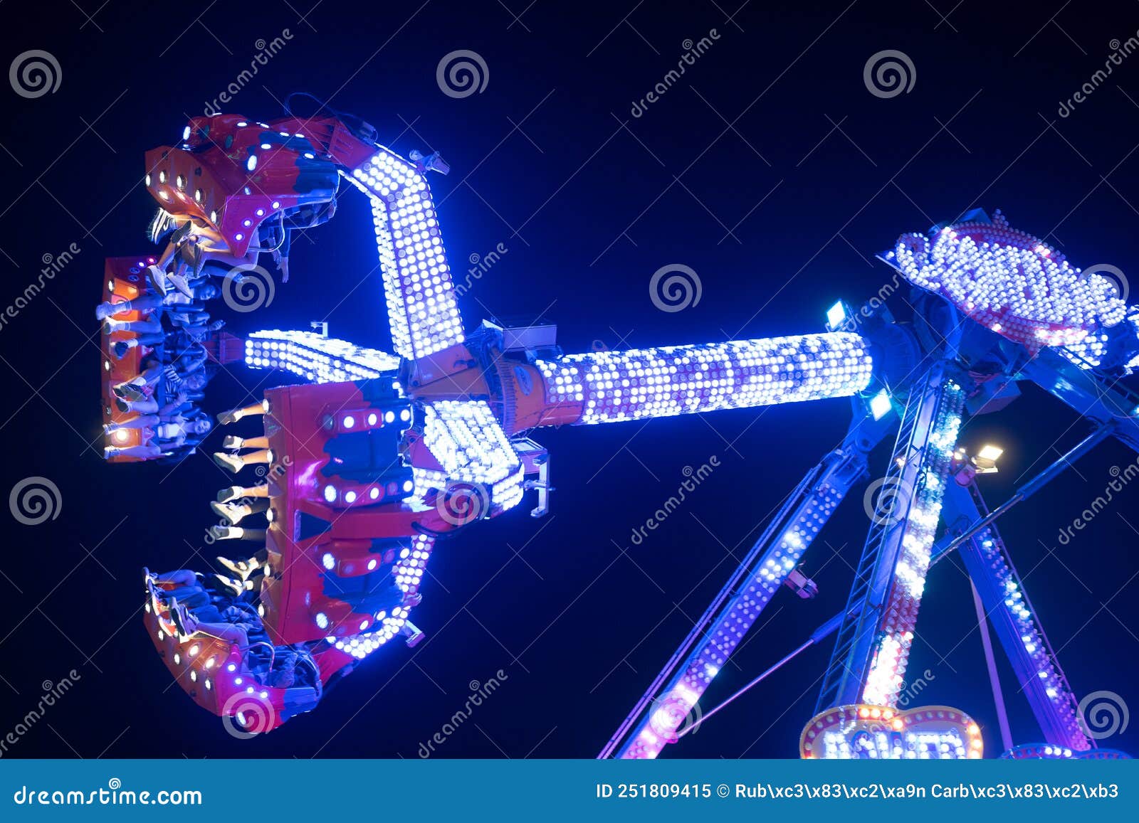 Amusement Ride with Bright Lights Stock Image - Image of county, dusk ...