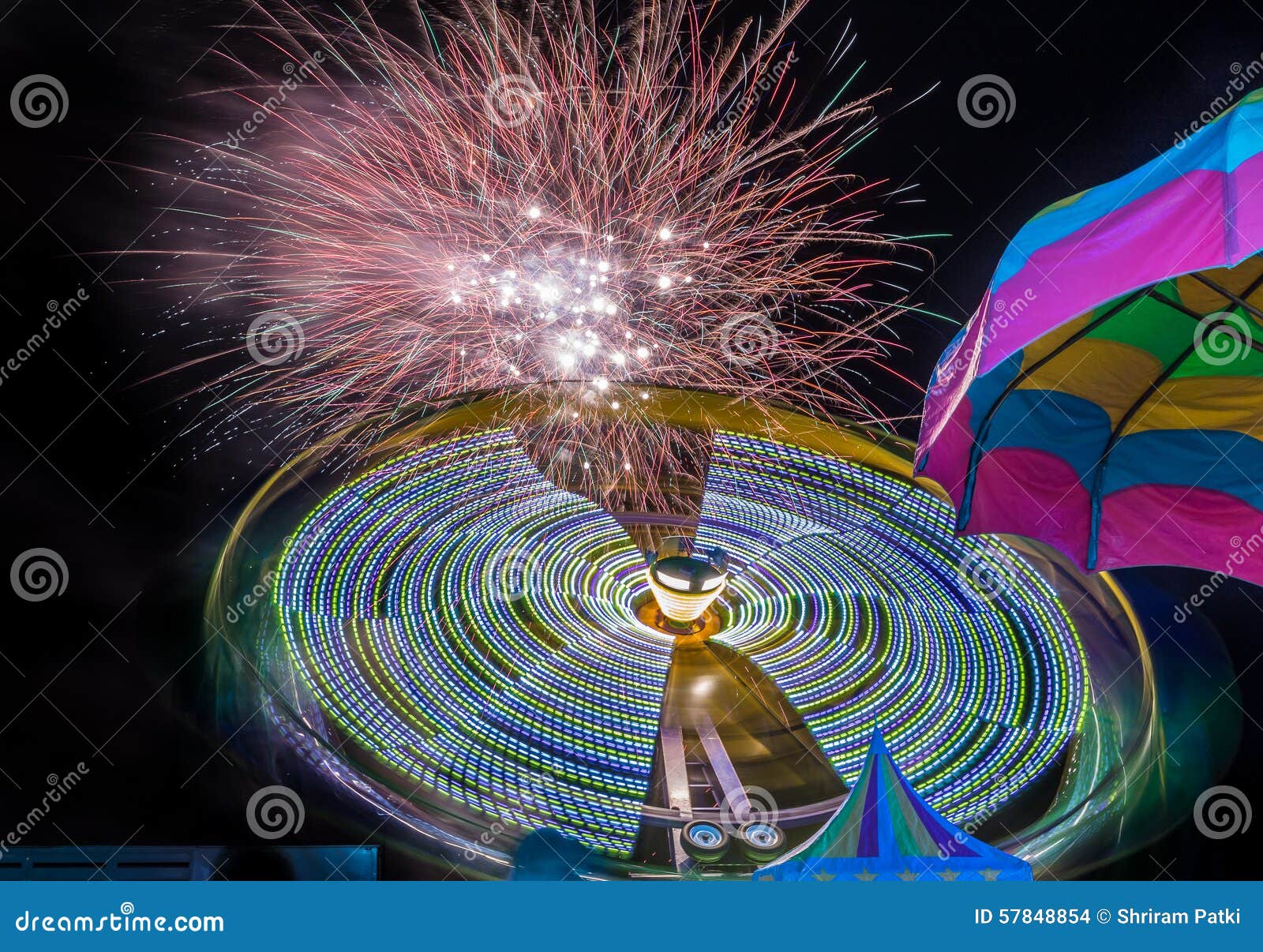 Amusement Ride and Fireworks Stock Photo - Image of fair, blue: 57848854