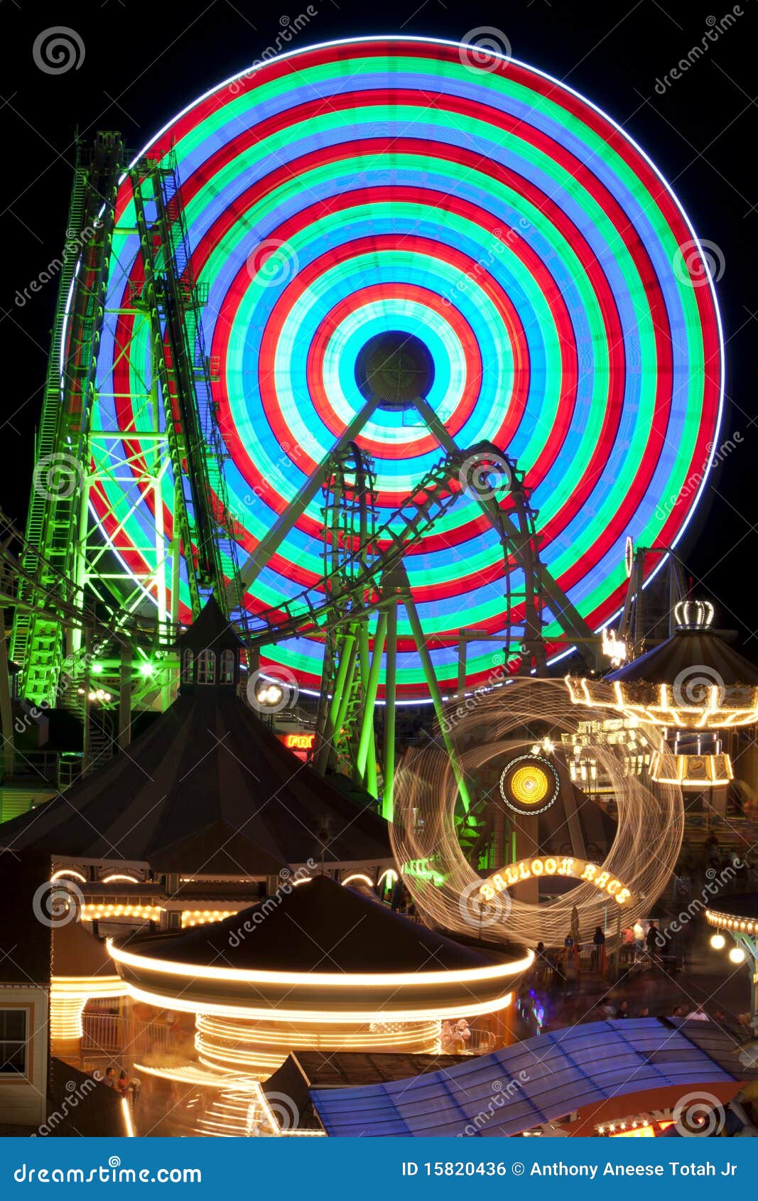 Amusement Rides at night stock photo. Image of festival - 15820436