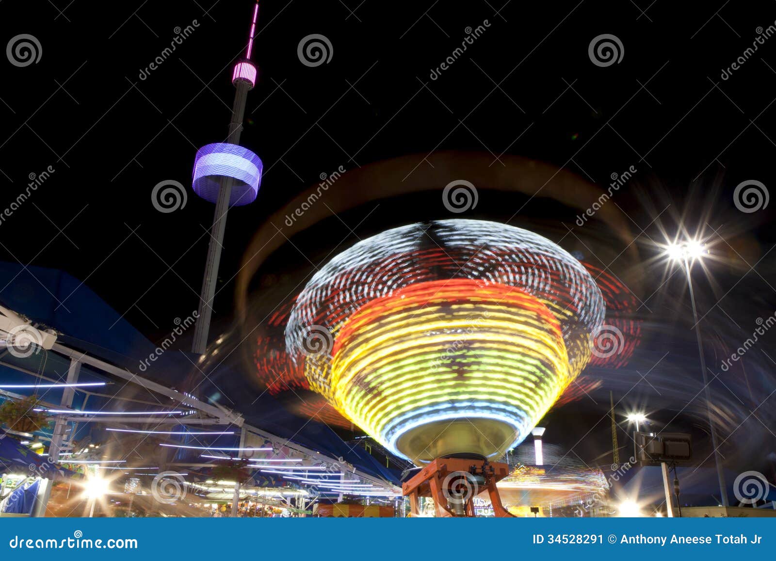 Amusement rides at night stock image. Image of copyspace - 34528291