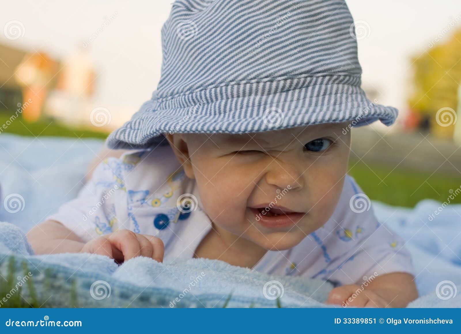 Amusing kid winks stock image. Image of threemonths, positive - 33389851