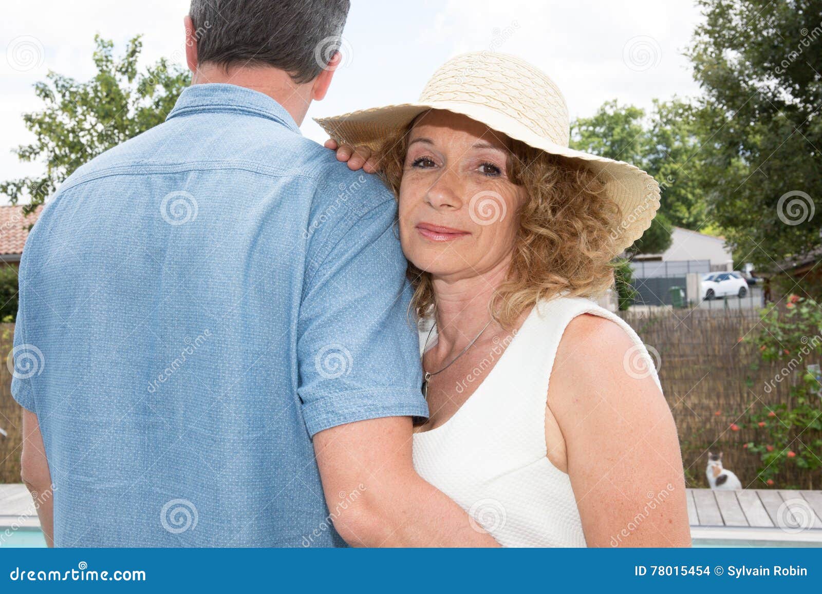 Amusing Mid Aged Couple Having Rest Near Pool Stock Photo - Image of ...
