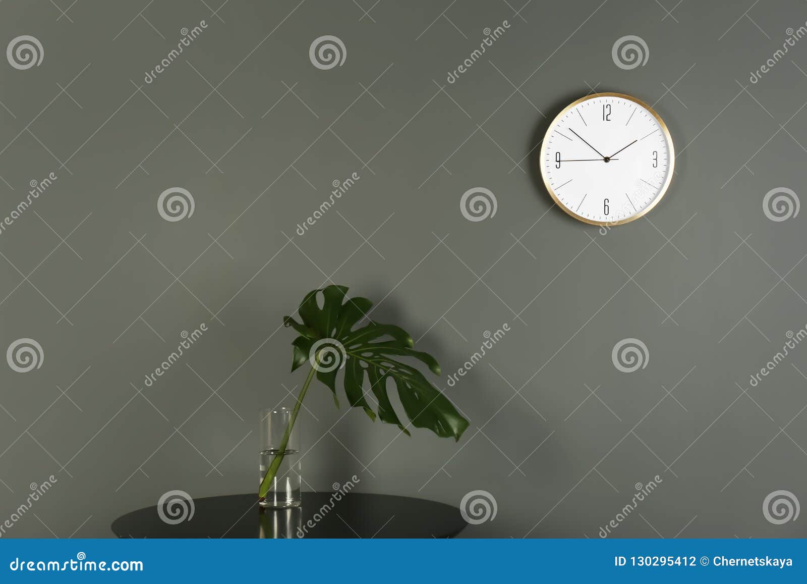 Analog Clock on Grey Wall Indoors Stock Photo - Image of countdown ...