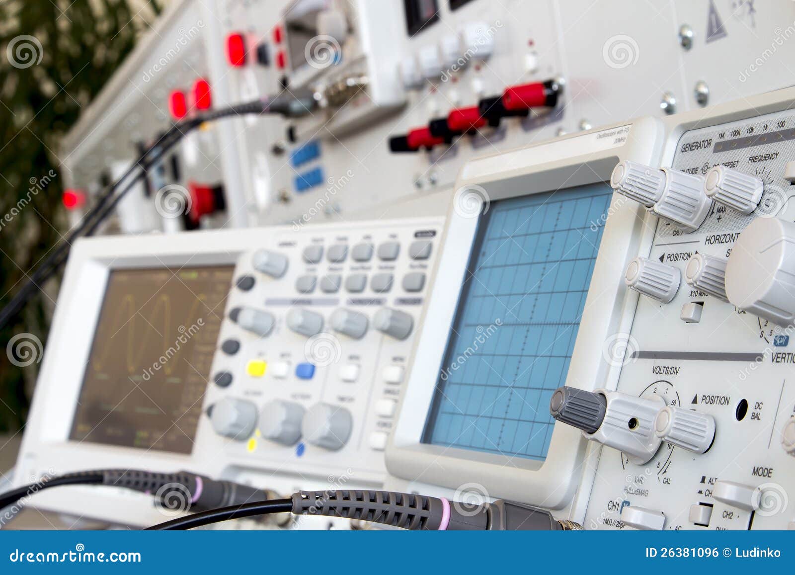 Analog and Digital Oscilloscope in the Foreground Stock Photo - Image ...