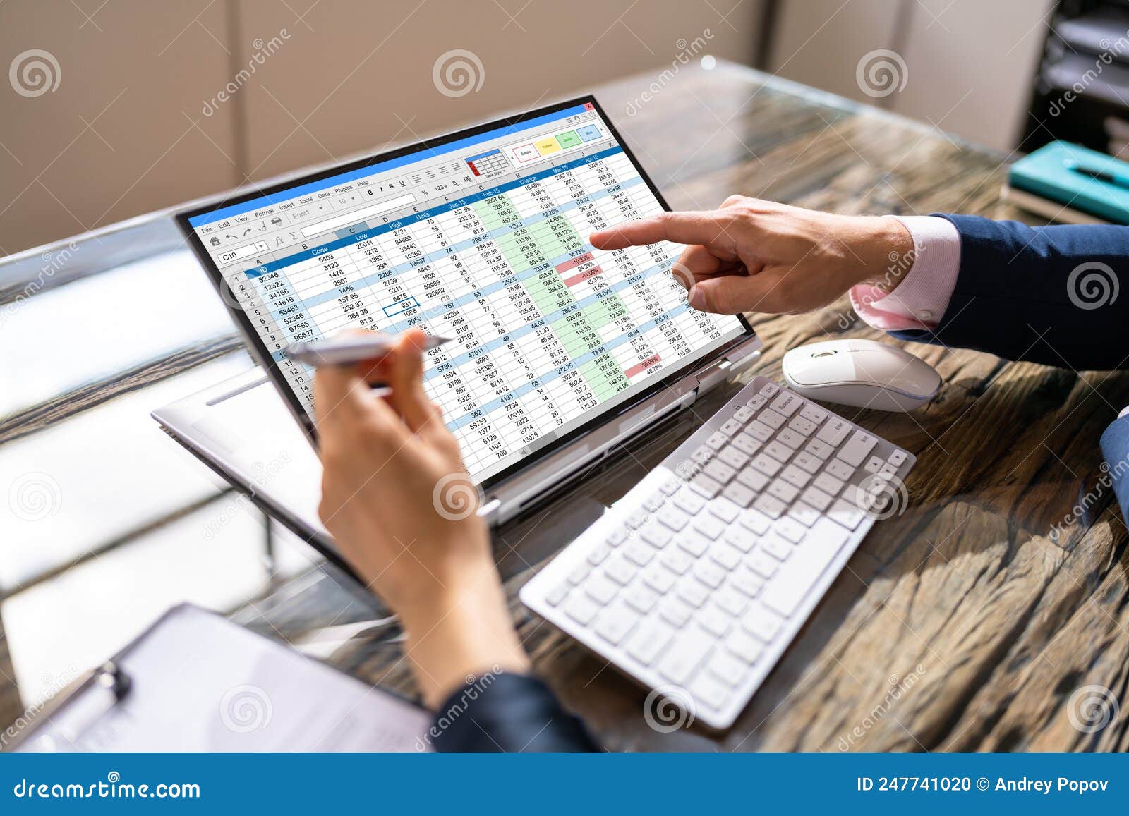 Analyst Employee Working on Spreadsheet Stock Photo - Image of people ... Analyst Employee Working on Spreadsheet Stock Photo - Image of people ...
