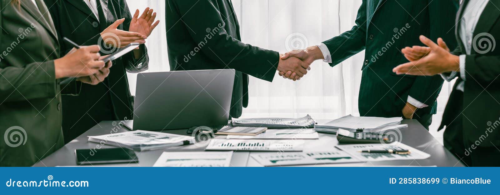 Analyst Team Celebrates Successful Data Analysis with Handshake ...