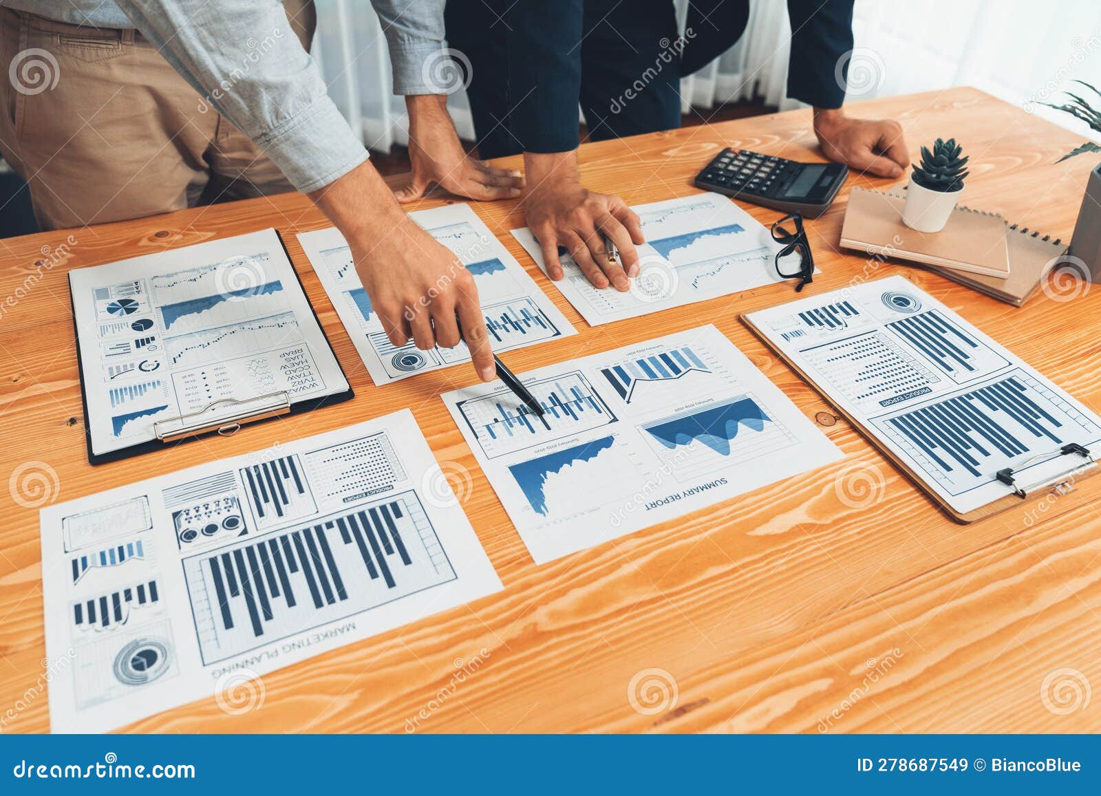 Analyst Team in Office Analyzing Financial Data Analysis Papers. Entity ...