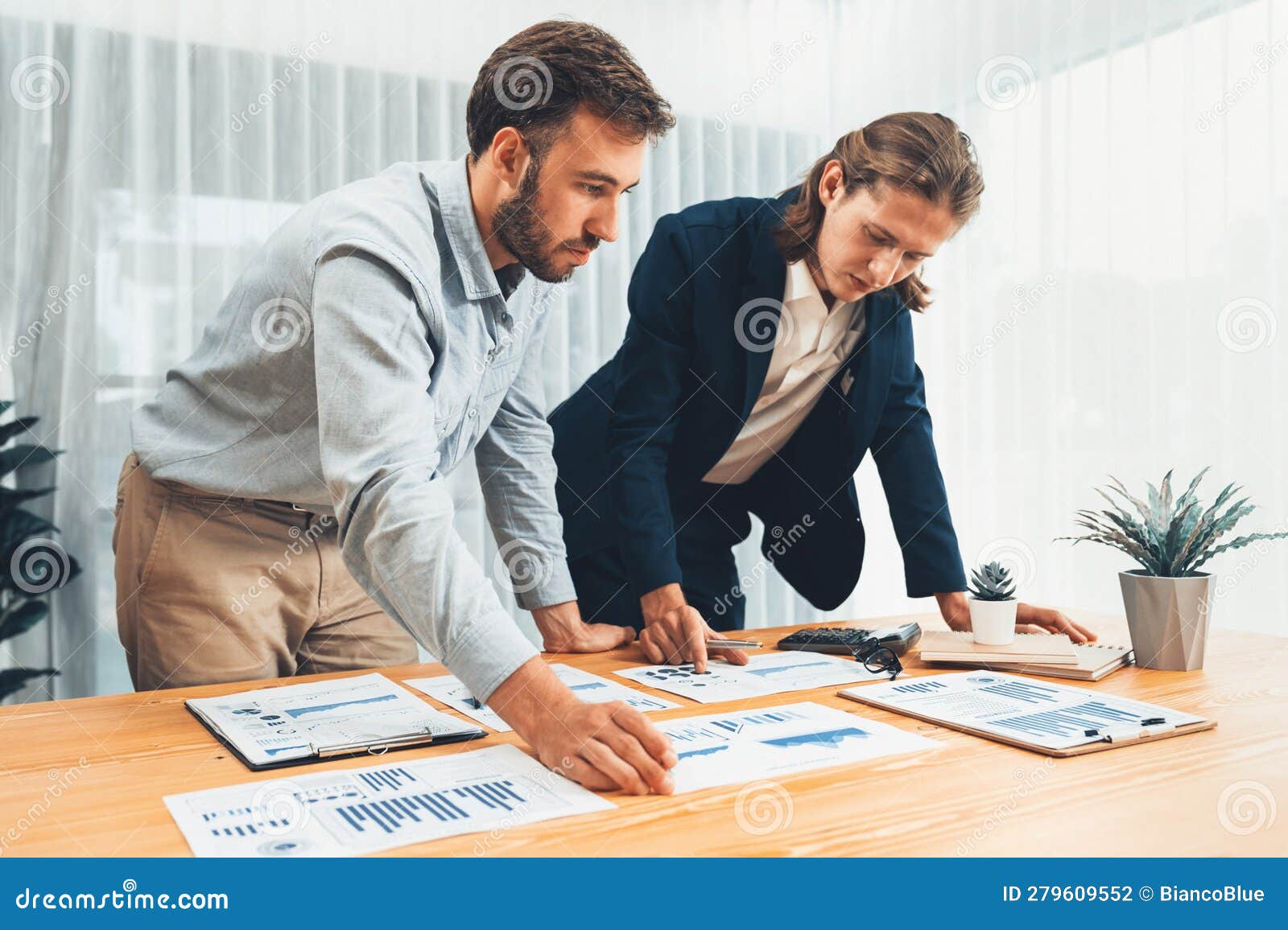 Analyst Team in Office Analyzing Financial Data Analysis Papers. Entity ...