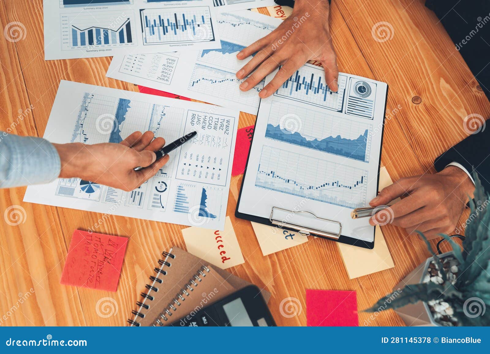 Analyst Team in Office Analyzing Financial Data Analysis Papers. Entity ...