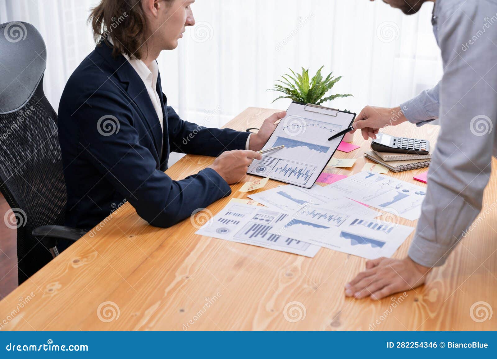 Analyst Team in Office Analyzing Financial Data Analysis Papers. Entity ...