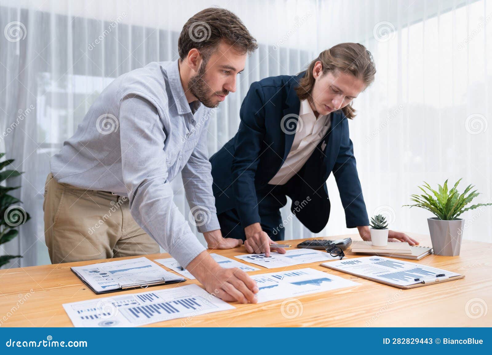 Analyst Team in Office Analyzing Financial Data Analysis Papers. Entity ...