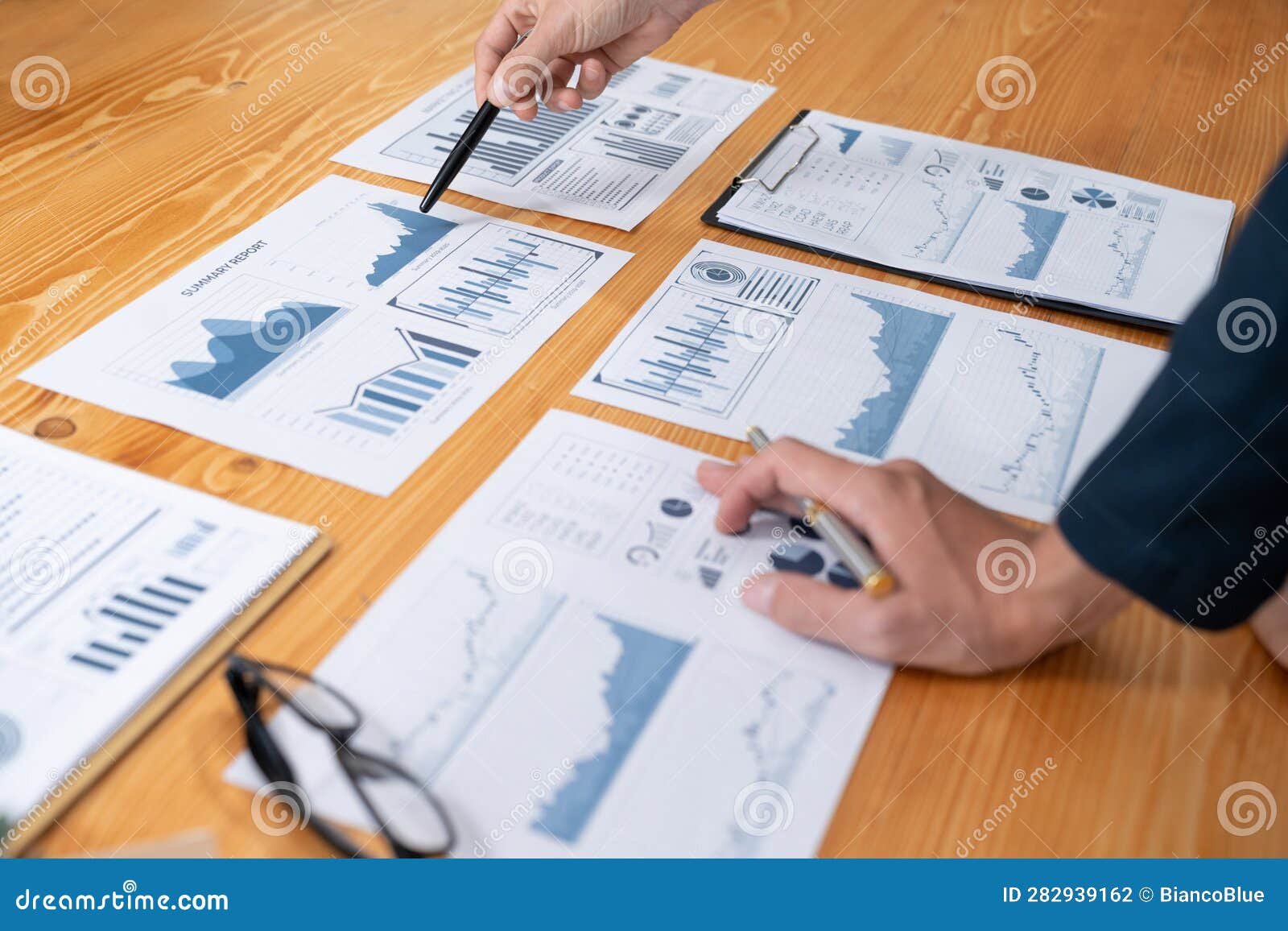 Analyst Team in Office Analyzing Financial Data Analysis Papers. Entity ...