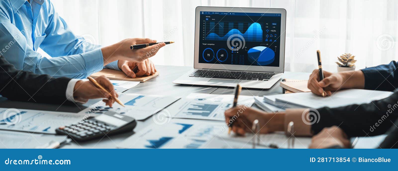 Analyst Team Working on Data Analysis Dashboard on Laptop Screen ...