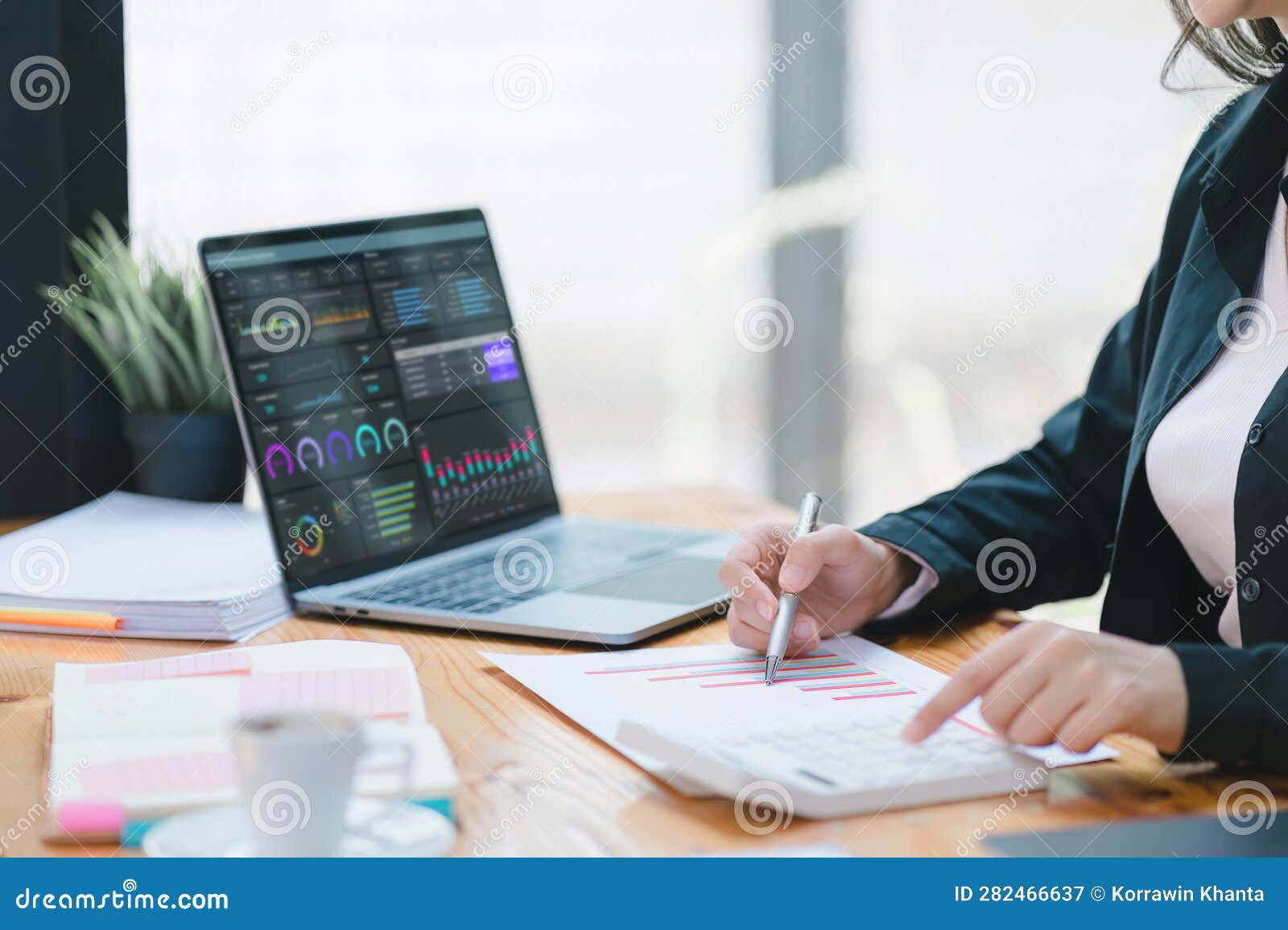 The Analyst is Using a Computer and a Dashboard for Business Data ...