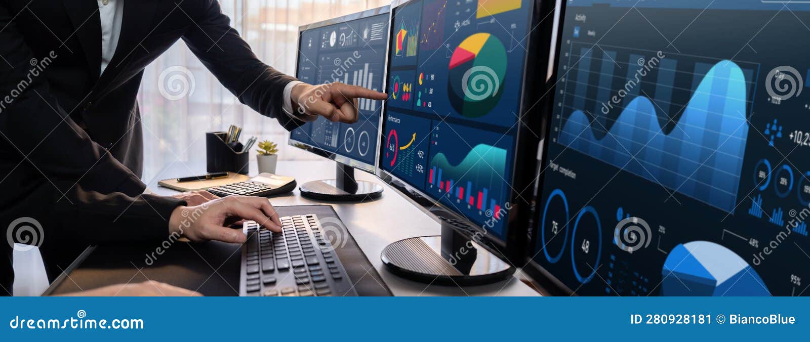 Analyst Working on BI Dashboard on Computer Monitor. Trailblazing Stock ...