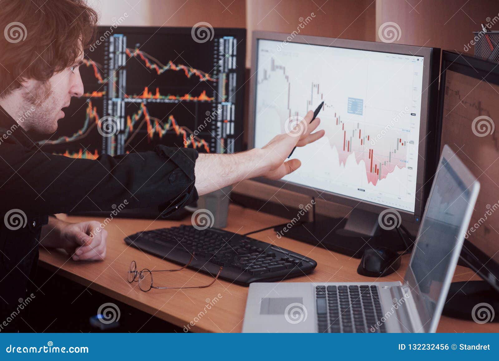 Analyzing Data. Close-up of Young Businessman Pointing on the Data ...
