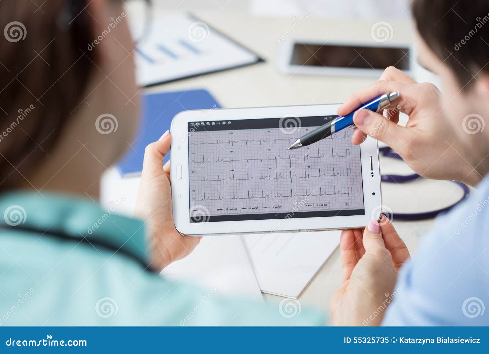 Analyzing Electrocardiogram on a Tablet Stock Image - Image of blonde ...