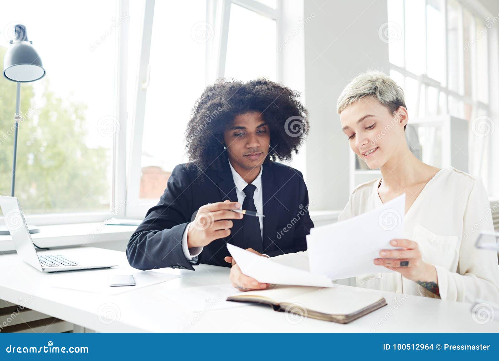 Analyzing Work Results with Coworker Stock Photo - Image of ...