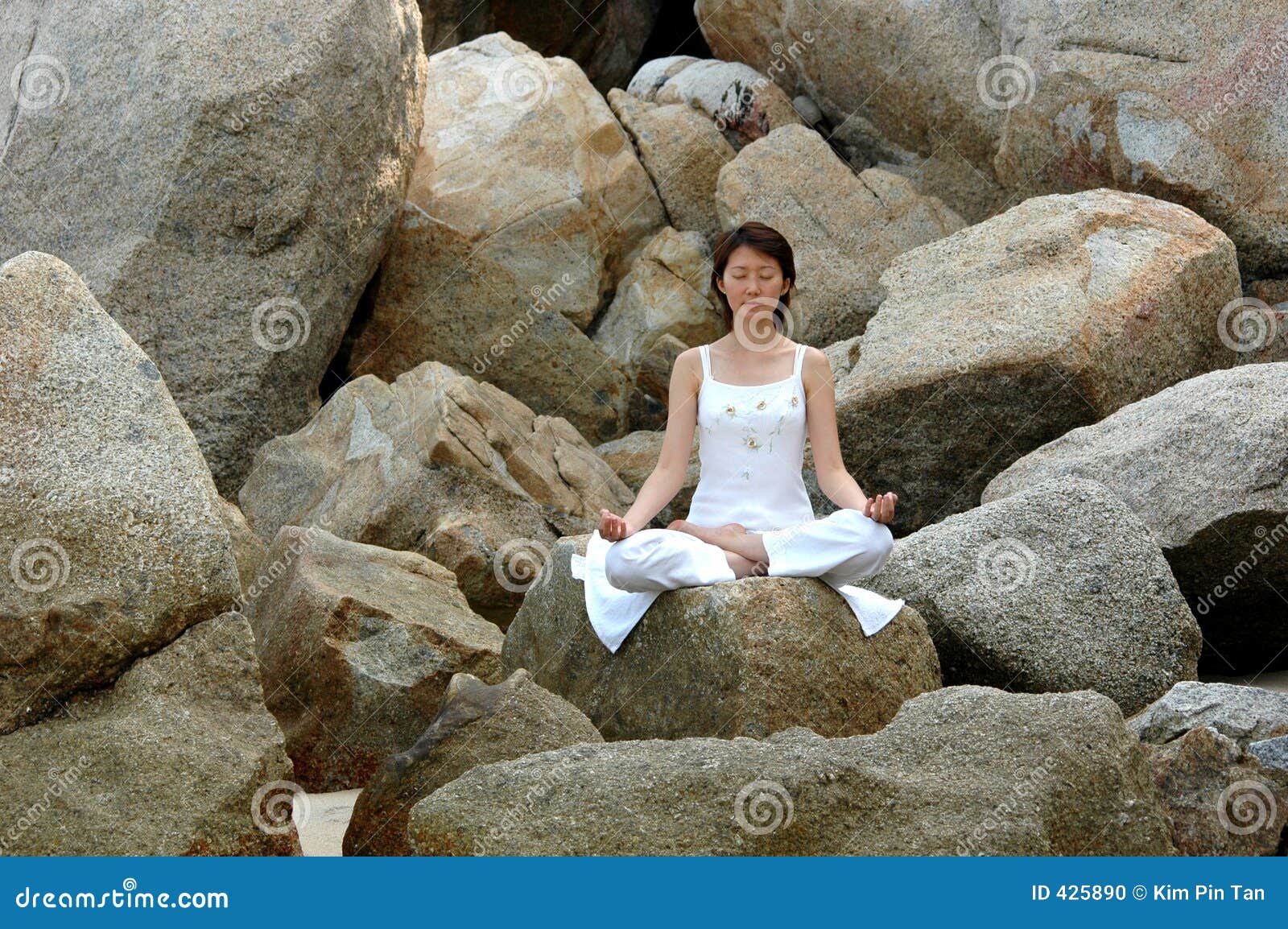 Ananda Yoga on the rock stock photo. Image of relax, sunlight - 425890