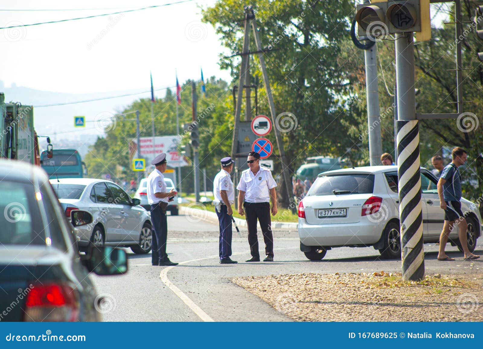 Traffic Police Stop Traffic Violators at an Intersection Editorial ...
