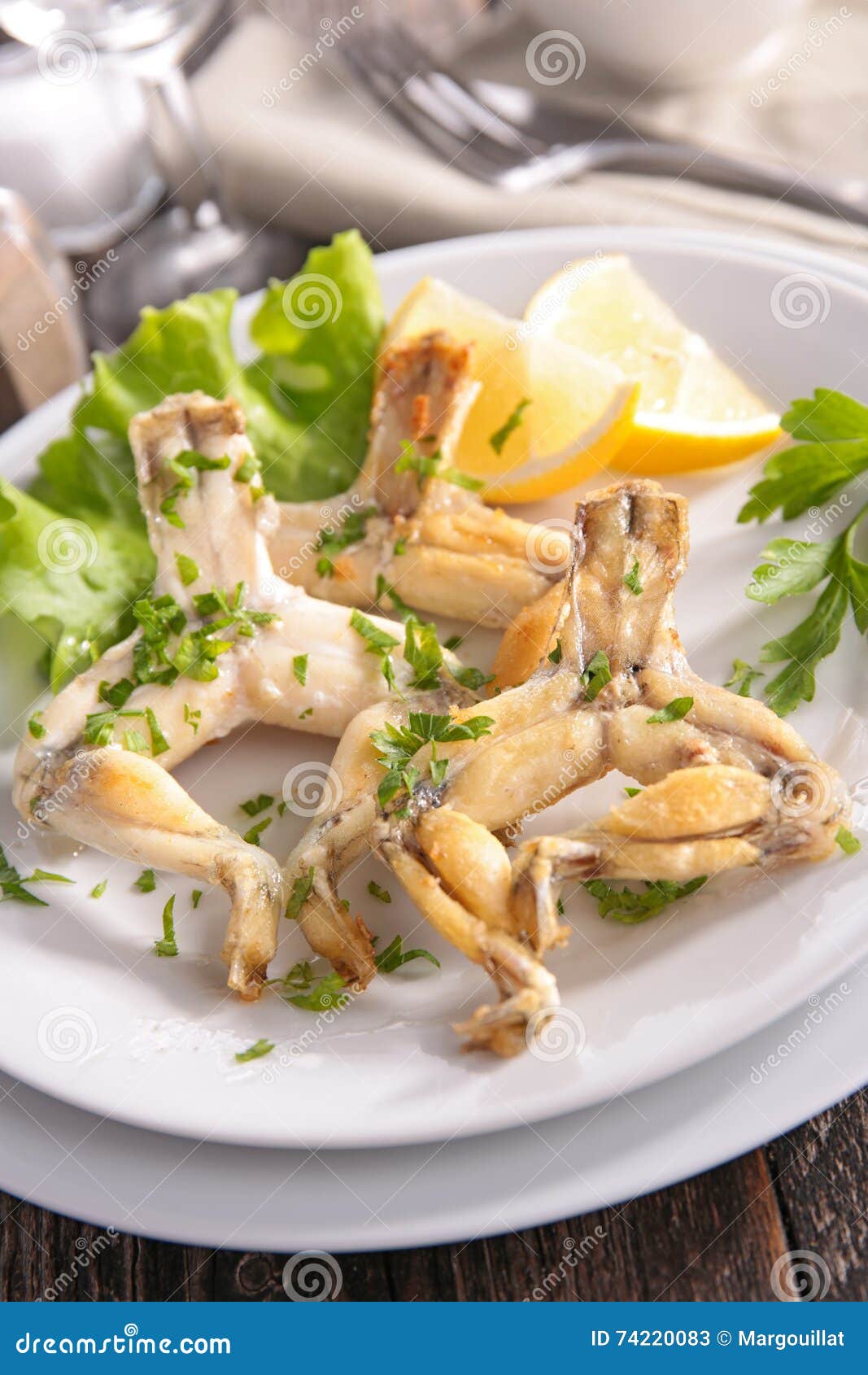 Anca de rana frita imagen de archivo. Imagen de comedor - 74220083