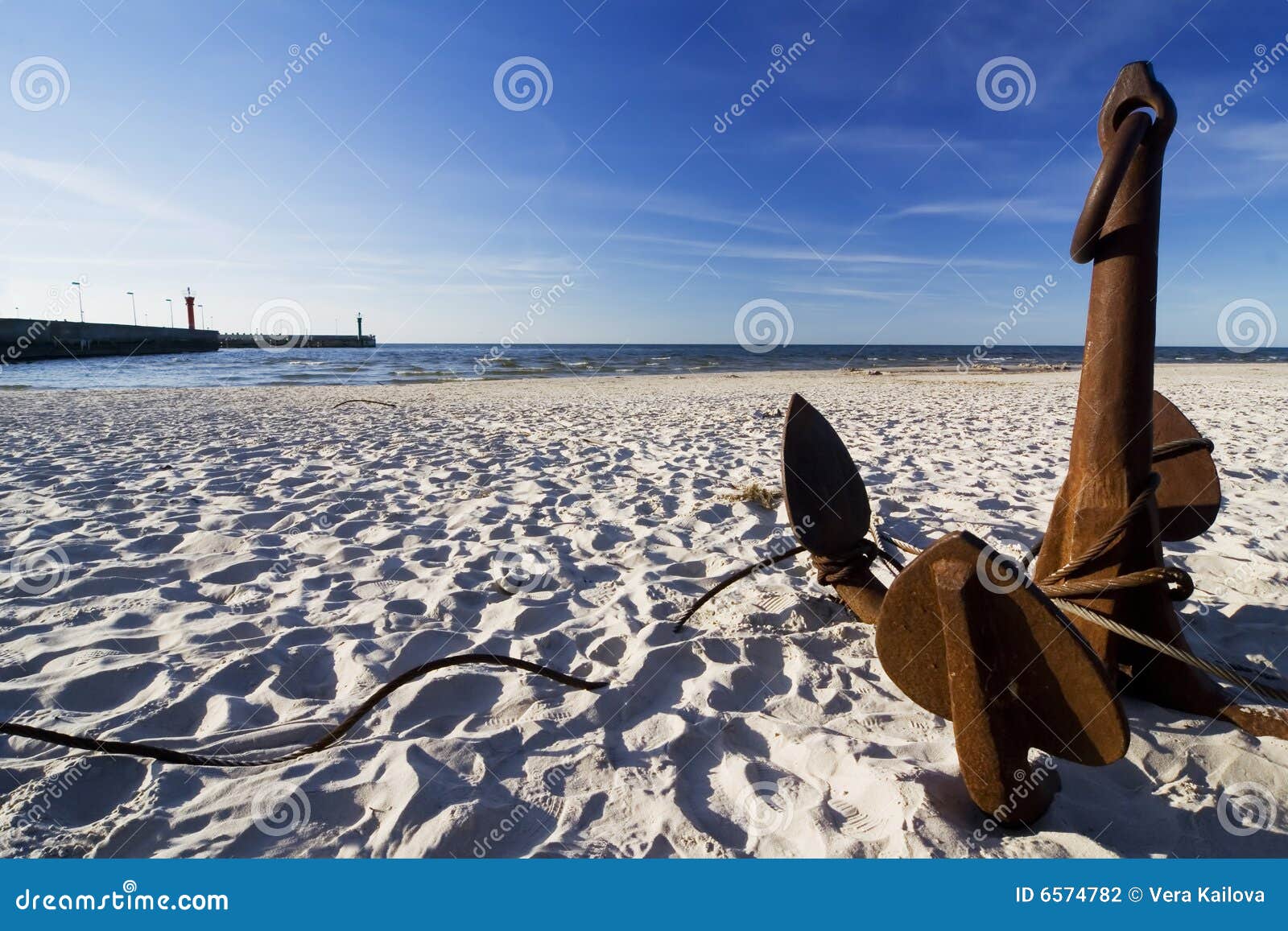 The anchor on the beach stock photo. Image of sand, blue - 6574782