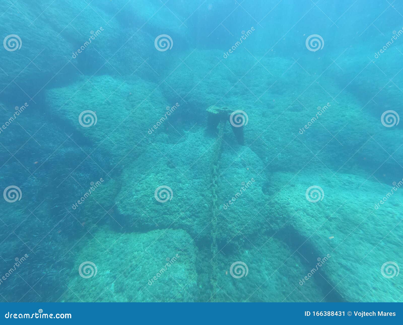 Anchor at the Bottom of the Sea Stuck on Stone Stock Image - Image of ...