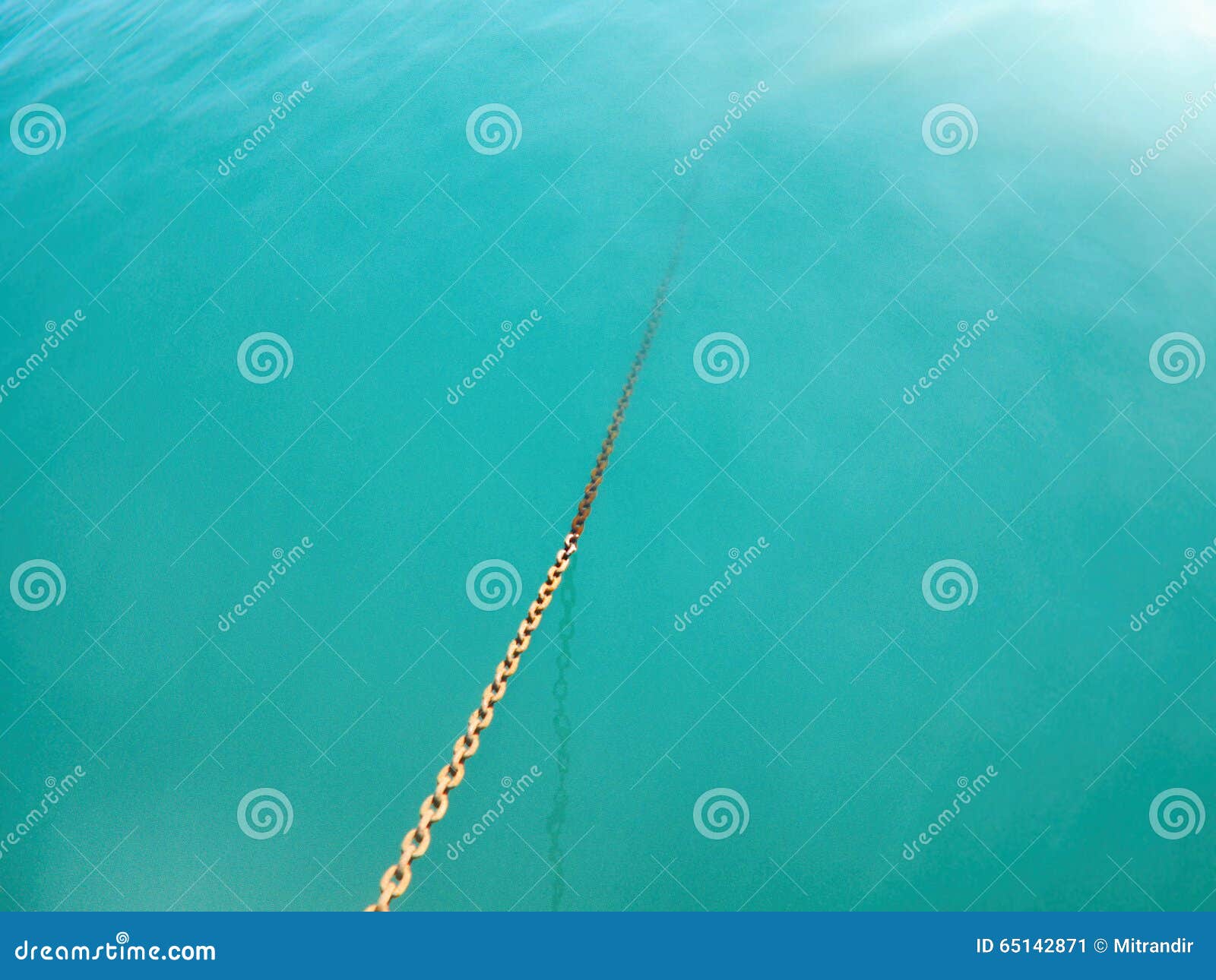 Anchor chain in the water stock image. Image of link - 65142871