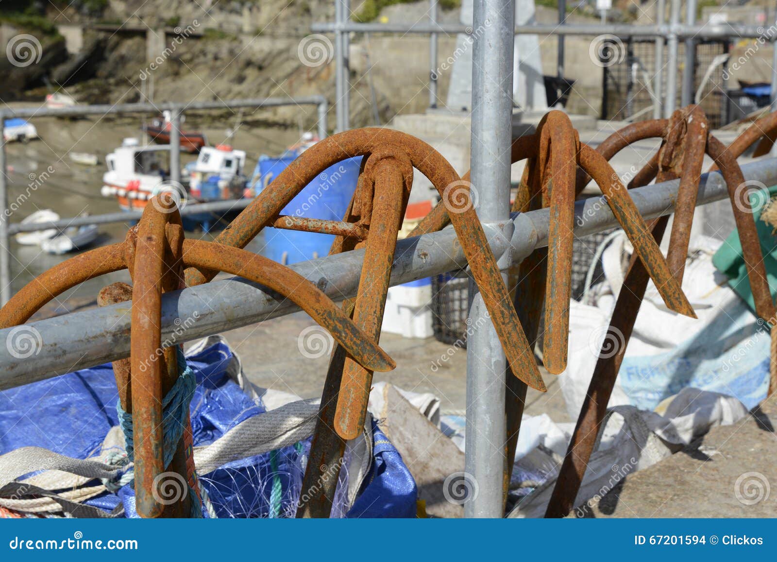 Anchors hanging on railing stock photo. Image of anchor - 67201594