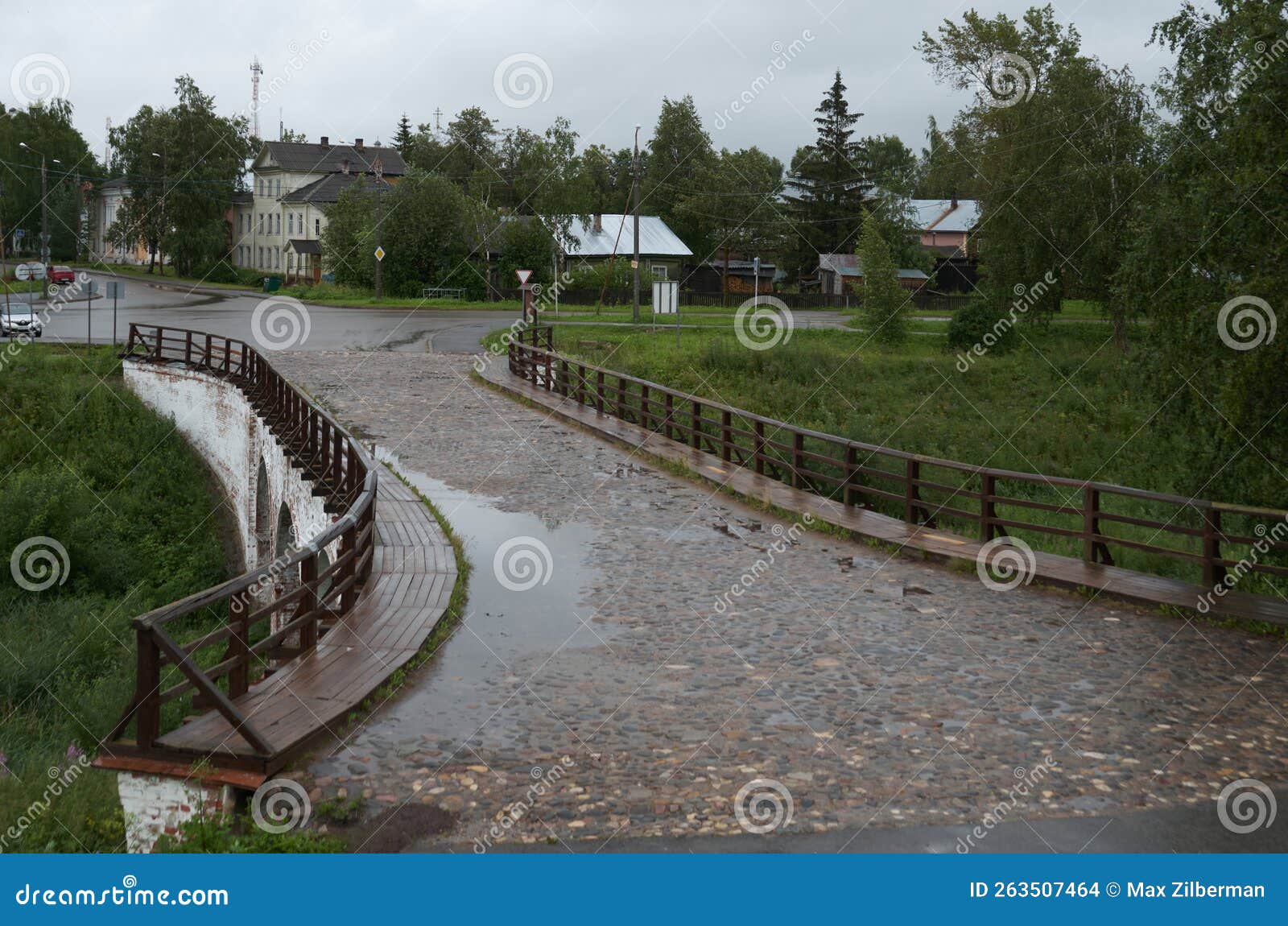 Ancient Arched Brick Bridge with Cobbled Pavement Stock Photo - Image ...