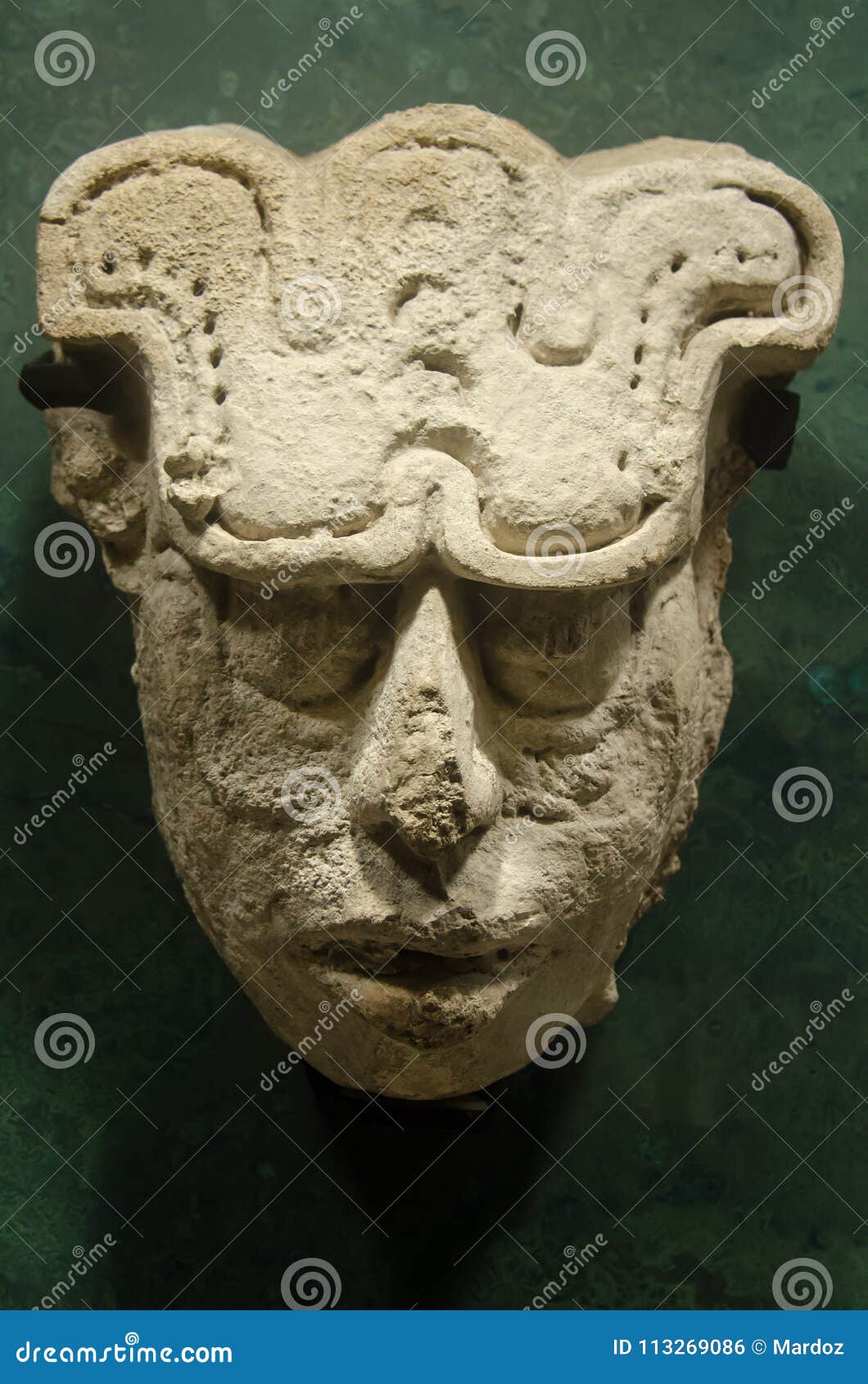 Ancient Mayan Head with a Glyph Engraved on Front Stock Photo - Image ...