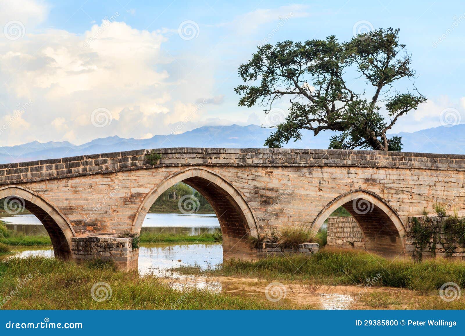 Ancient Arches Bridge in South China Stock Photo - Image of tourist ...
