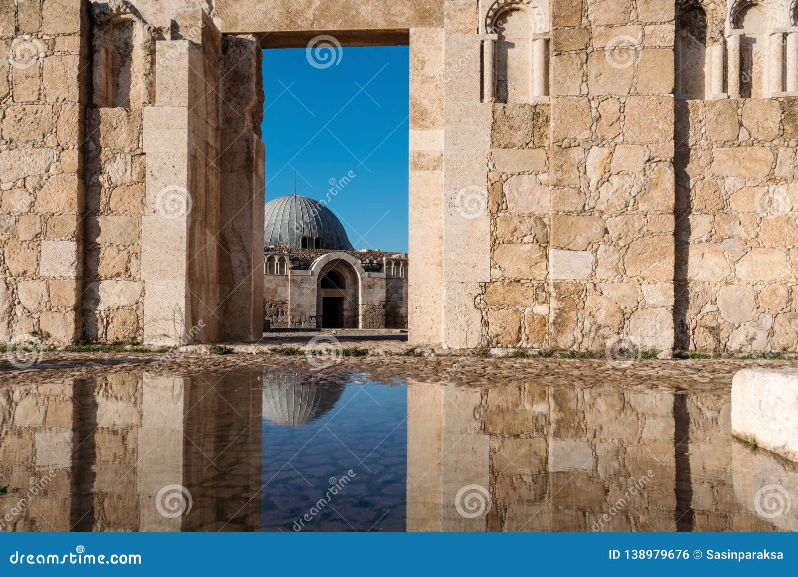 Ancient Architecture with Reflection on the Water at Citadel in Amman ...