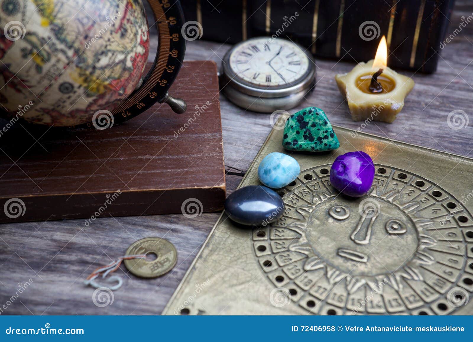 Ancient Astrology. Old Astrology Globe and Books with Lighting Candle ...