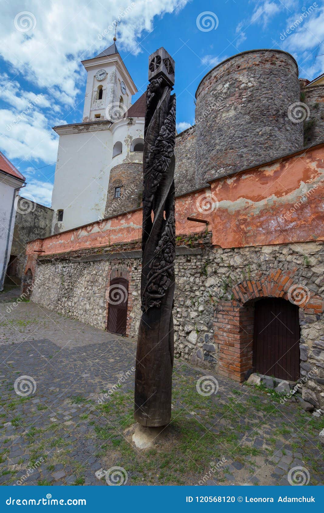 An Ancient Blackened by Time Wooden Pillar Covered with a Fringe of ...