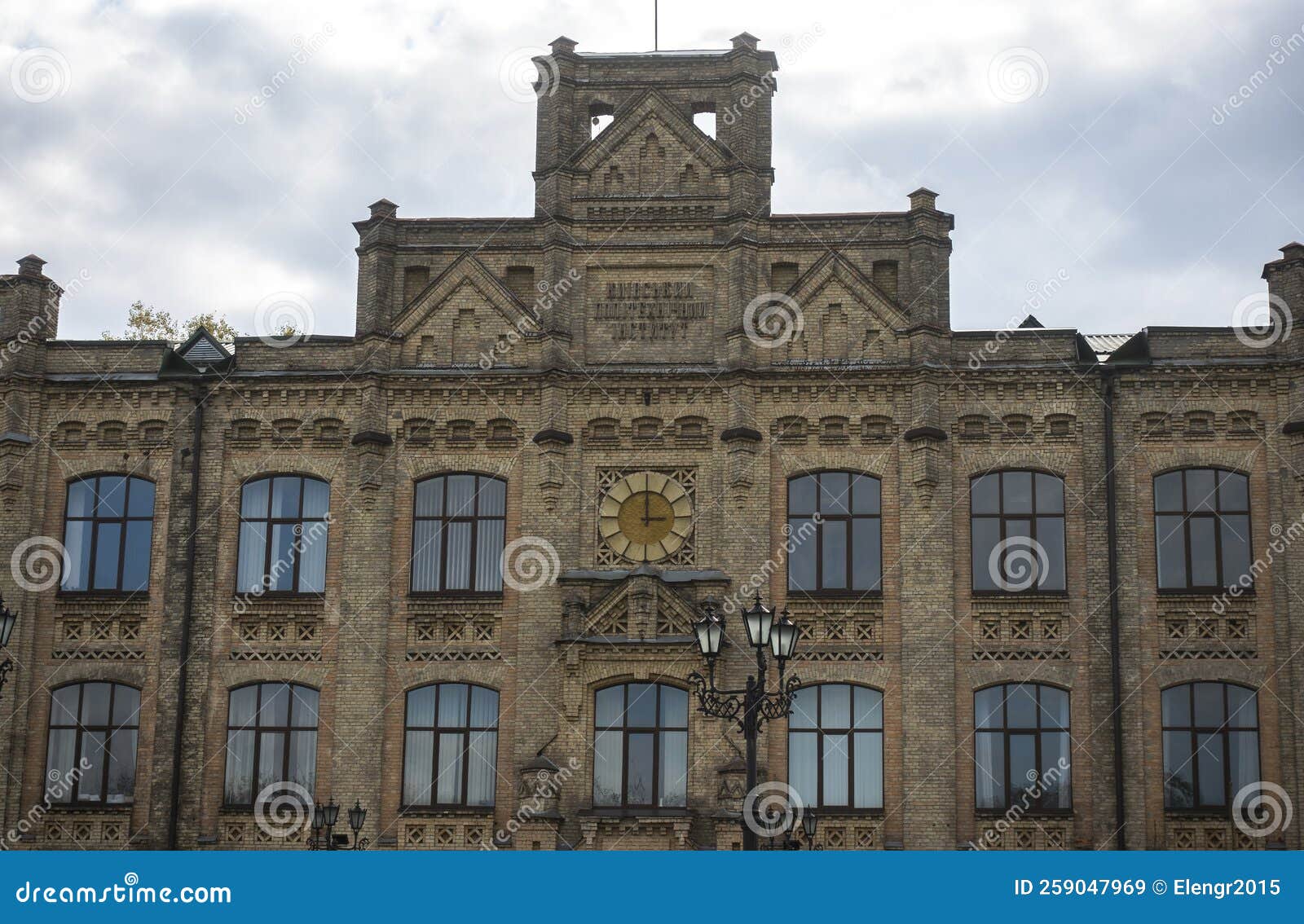 Ancient Brick Facade with a Clock of the Main Building of the Kyiv ...