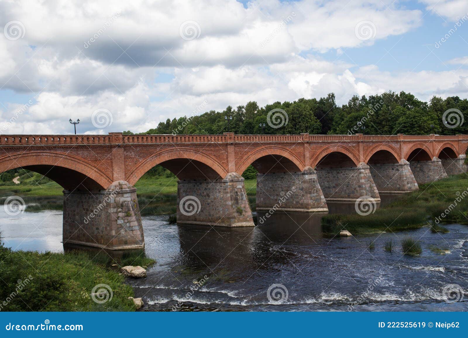 An Ancient Bridge Built of Stone and Red Bricks Stock Image - Image of ...