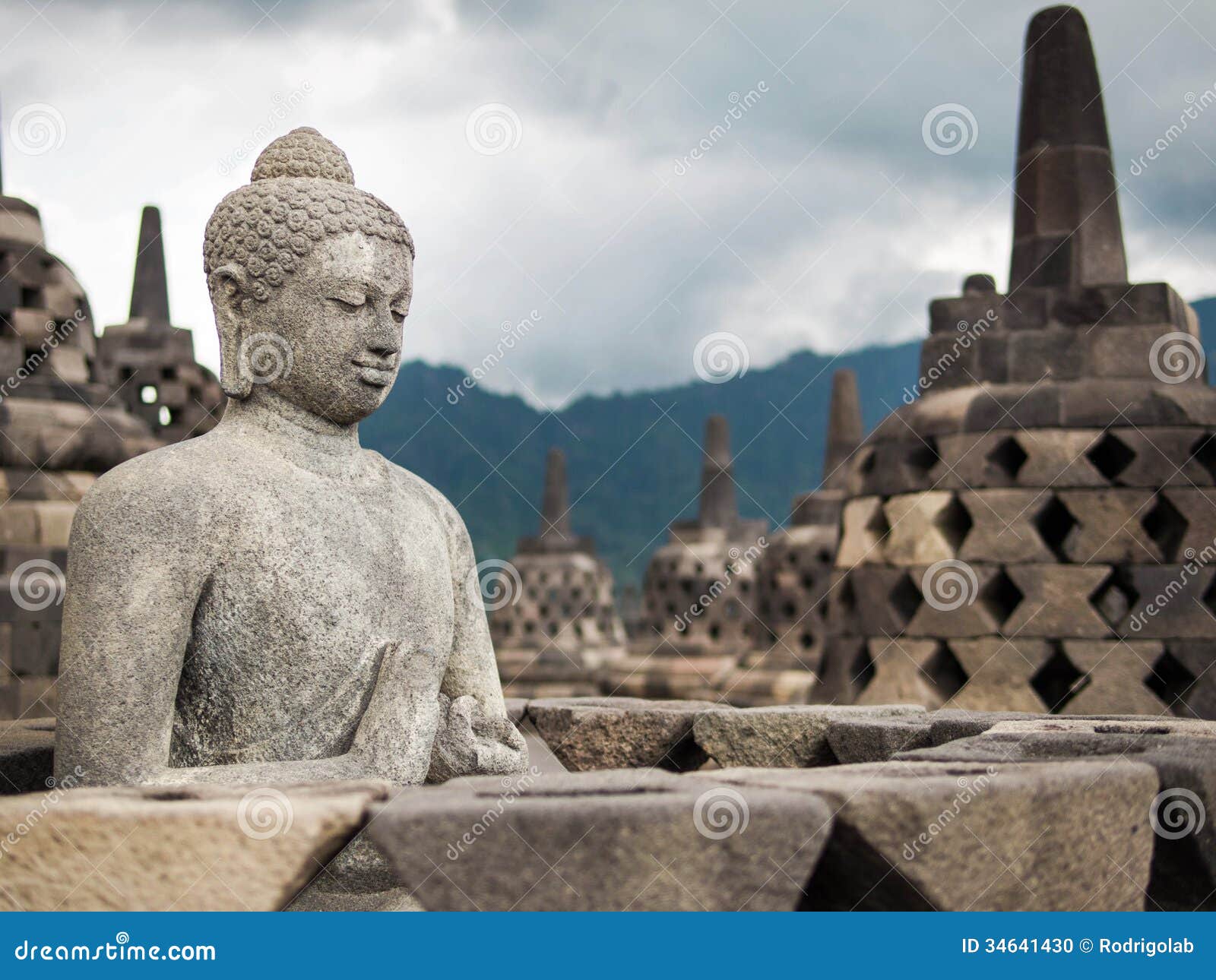 Ancient Buddha Statue at Borobudur, Indonesia Stock Photo - Image of ...