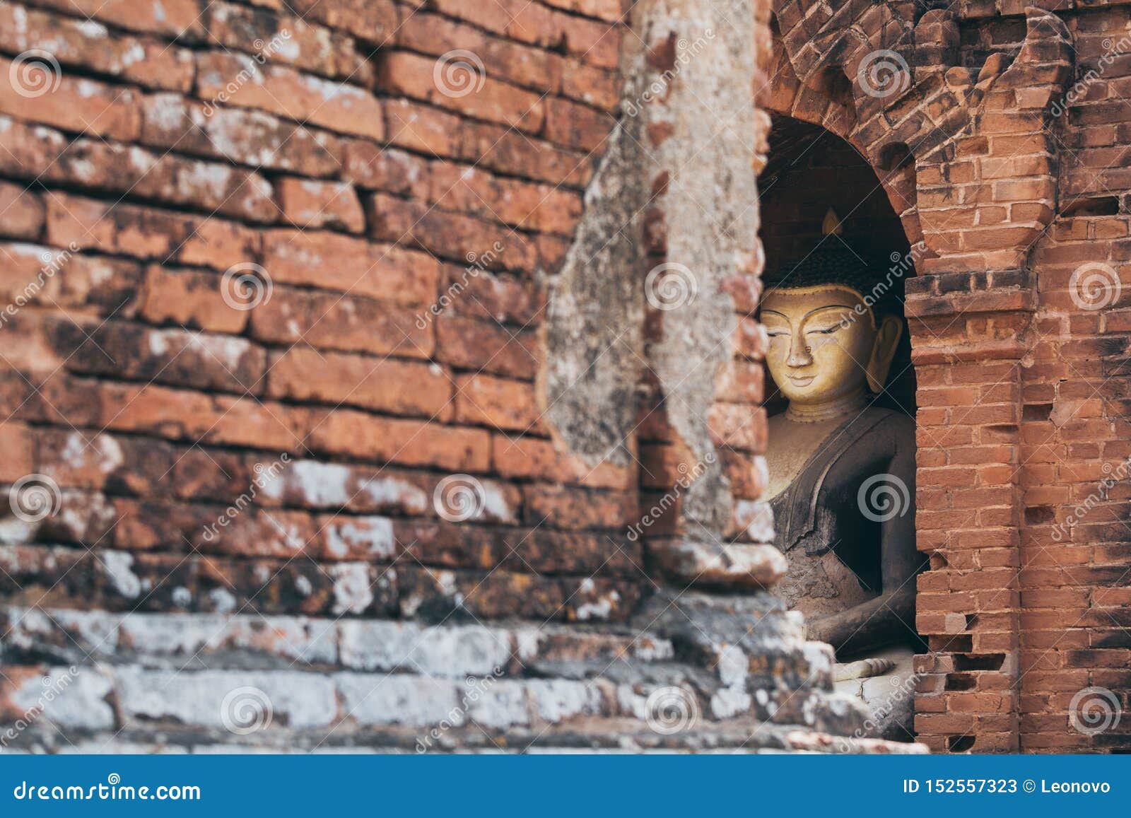 Ancient Buddha Statue Framed with Brick Arch in Bagan Temple, Myanmar ...