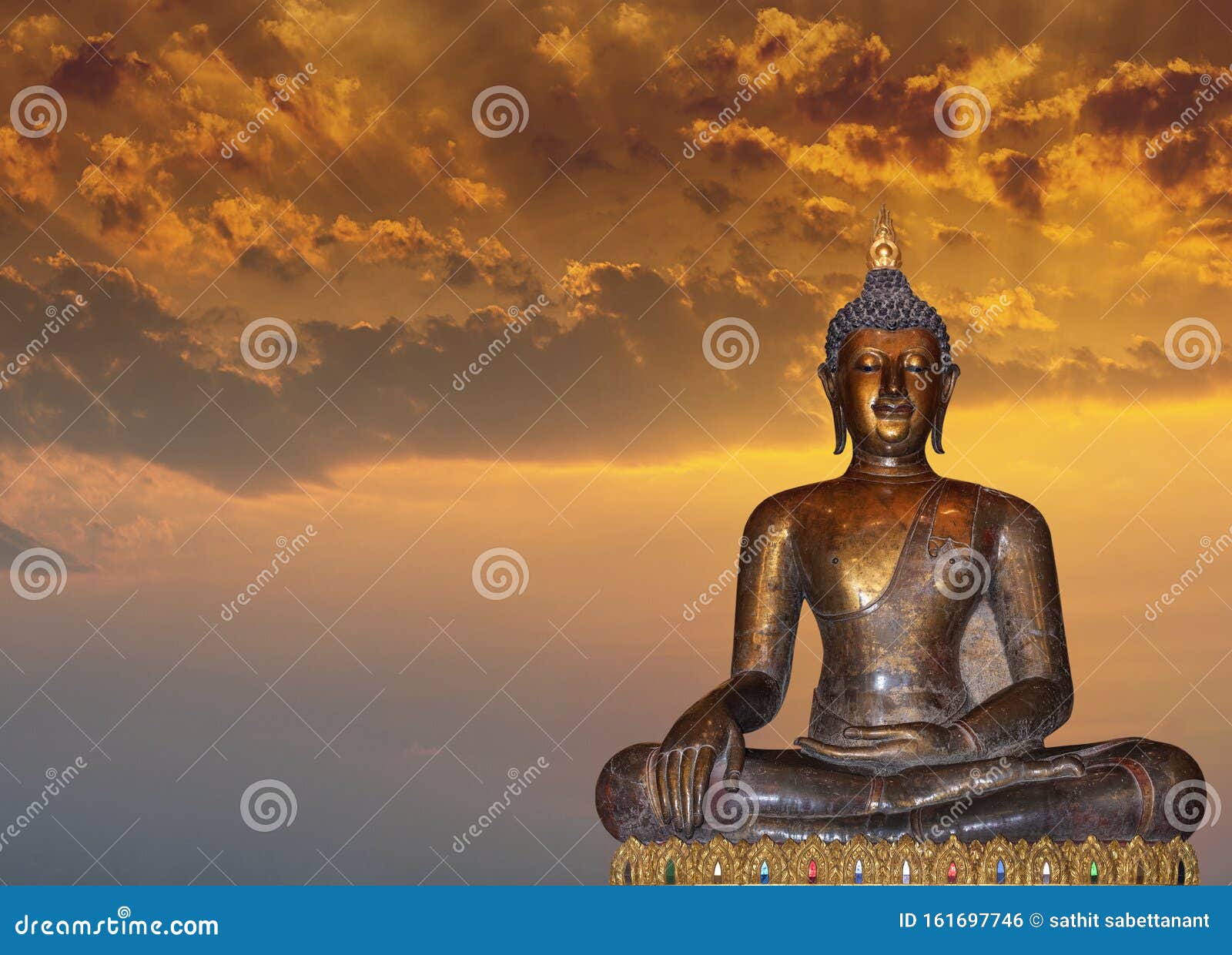 Ancient Buddha Statues and the Sky during the Sunset Stock Photo ...