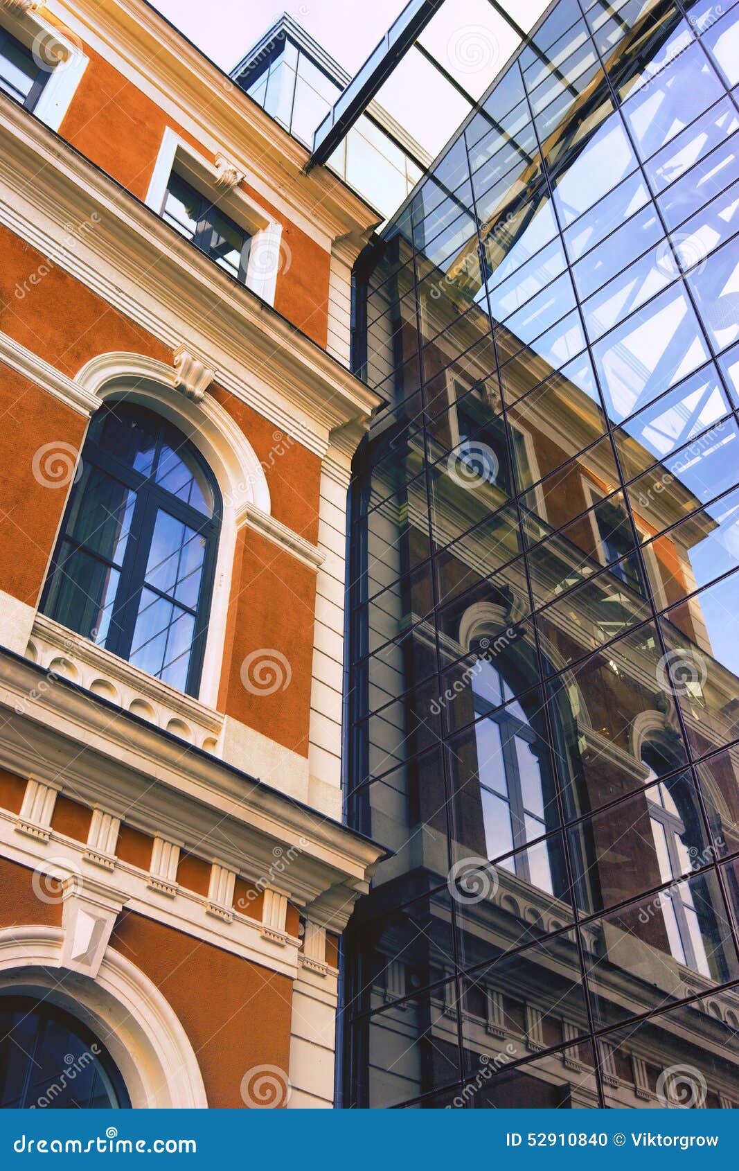 The Ancient Building is Reflected in a Modern House of Glass Stock ...