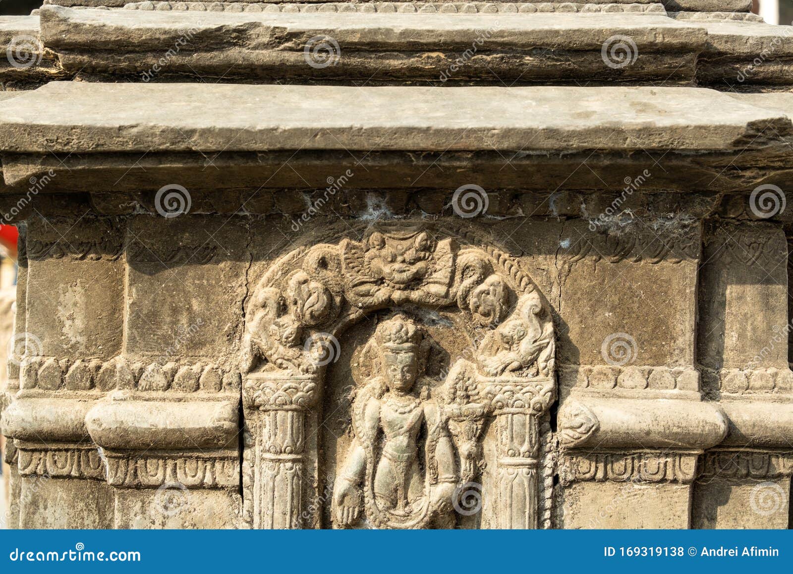 Ancient Carved Stone Pillar with the Image of a Buddha and are ...