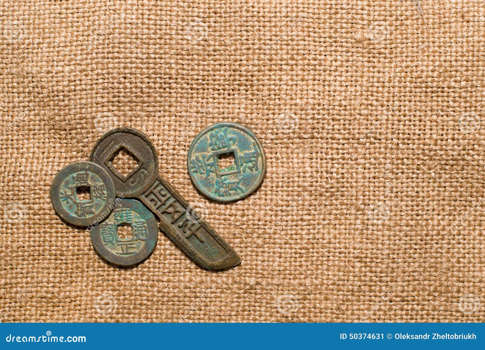 Ancient Chinese Bronze Coins on Old Cloth Stock Image - Image of pelf ...