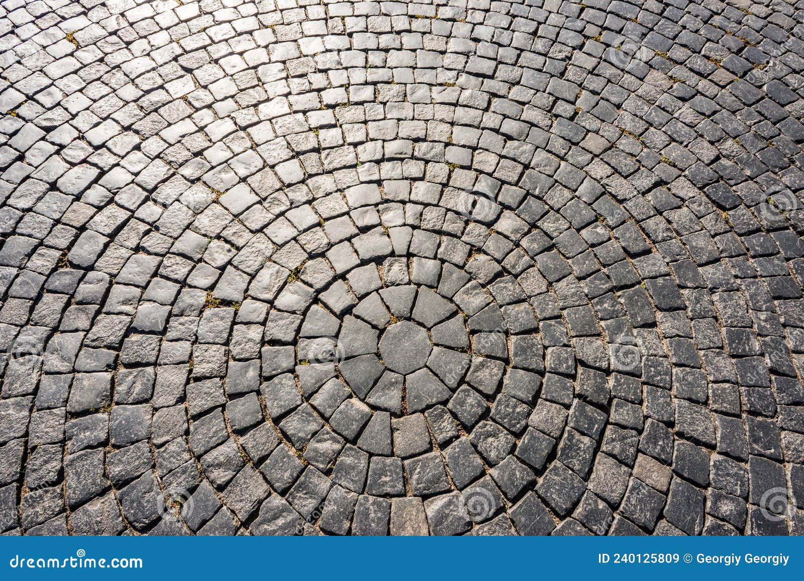 Ancient Cobblestone Paved Circle on the Pavement Stock Image - Image of ...