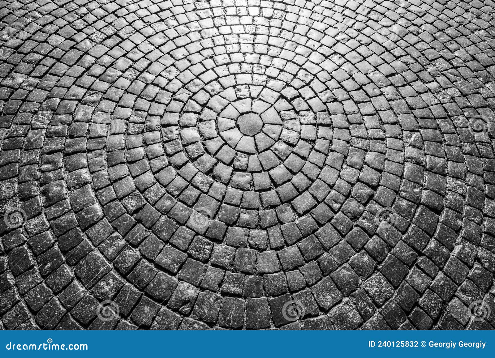 Ancient Cobblestone Paved Circle on the Pavement Stock Photo - Image of ...