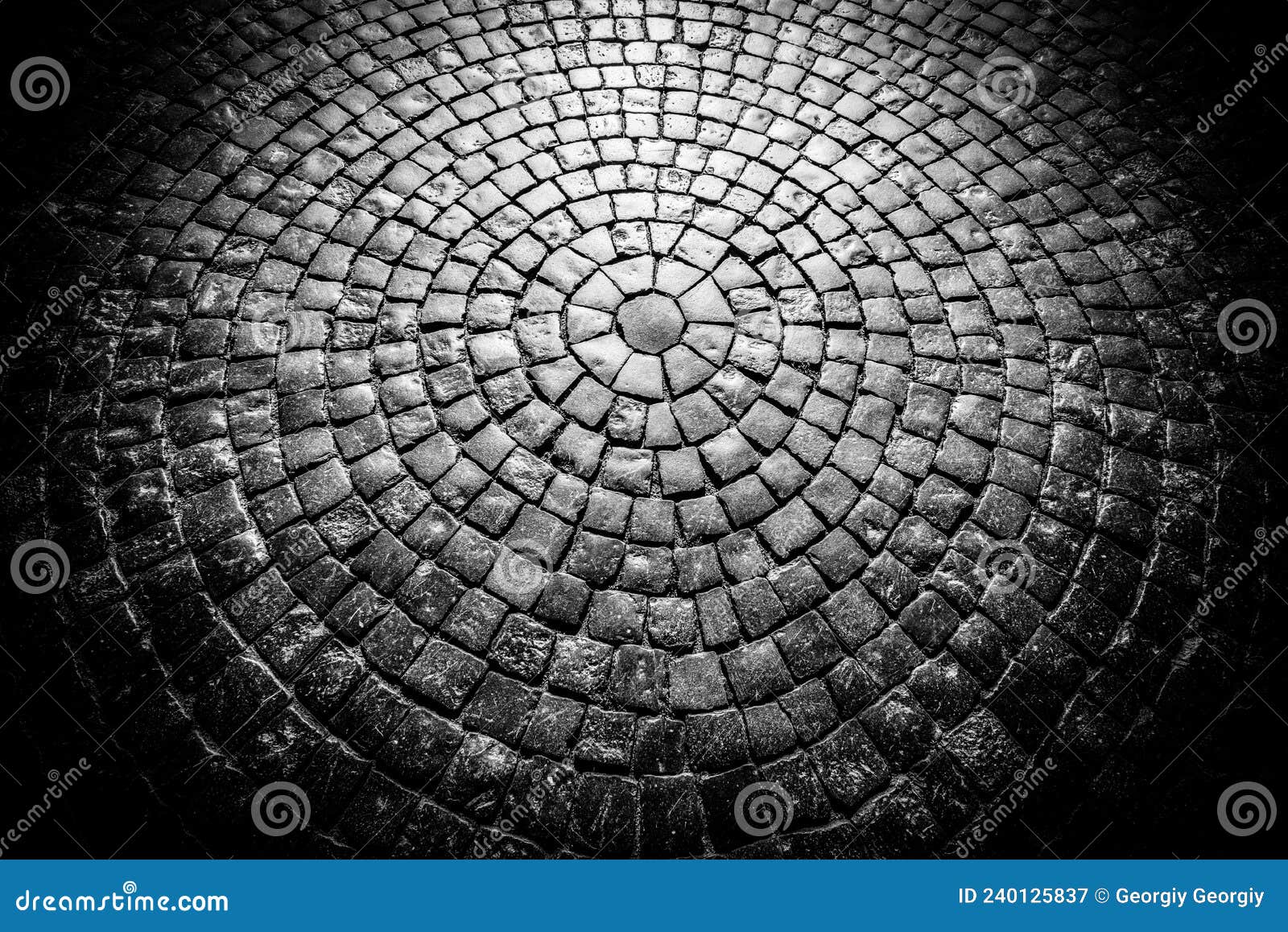 Ancient Cobblestone Paved Circle on the Pavement Stock Image - Image of ...